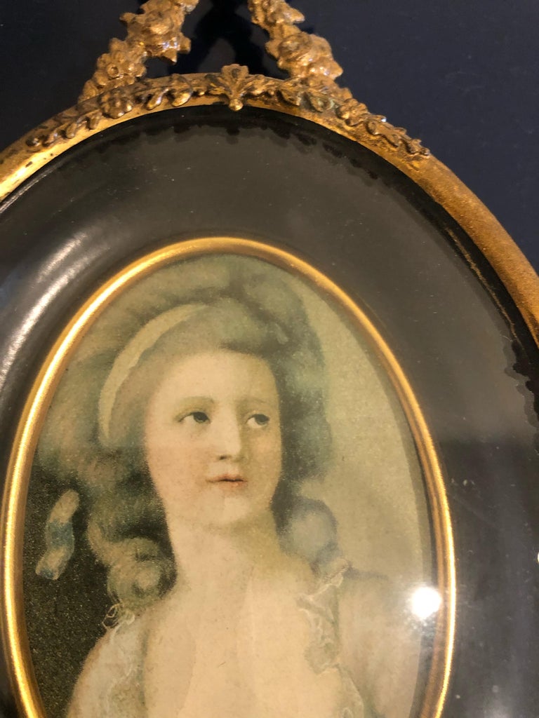 Lovely Pair of Antique Portrait Miniatures in Fancy Brass Frames at 1stDibs