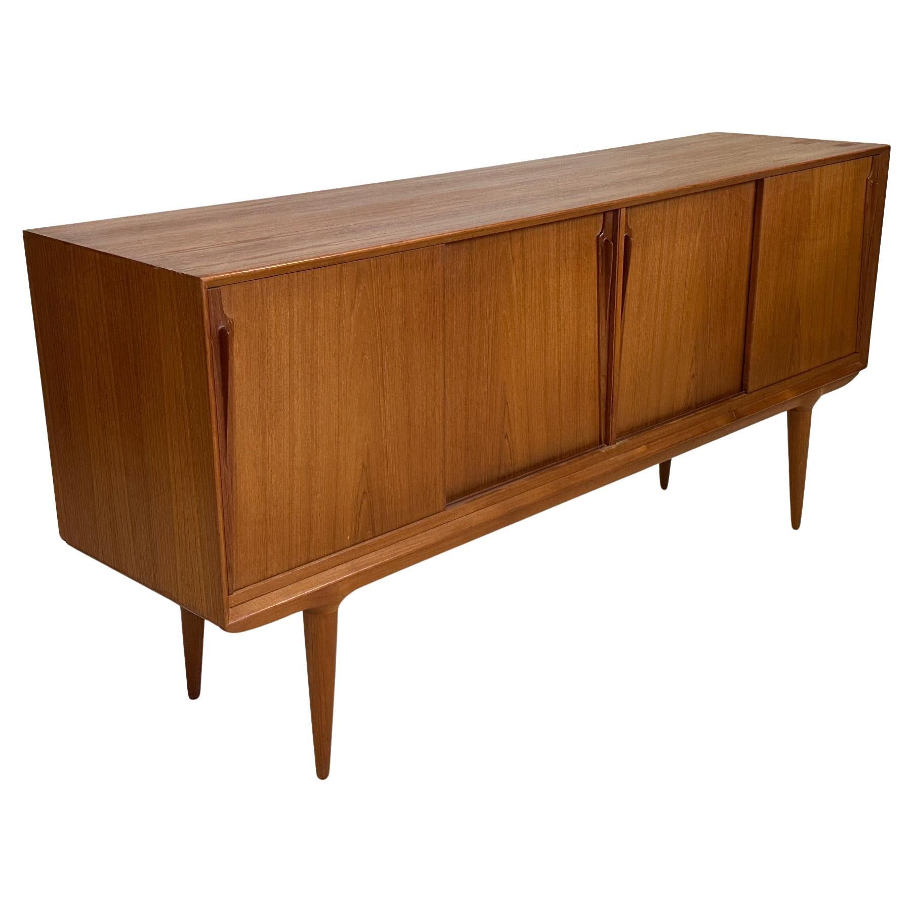 Low teak sideboard by Gunni Omann, Omann Jun, Denmark. For Sale at 1stDibs