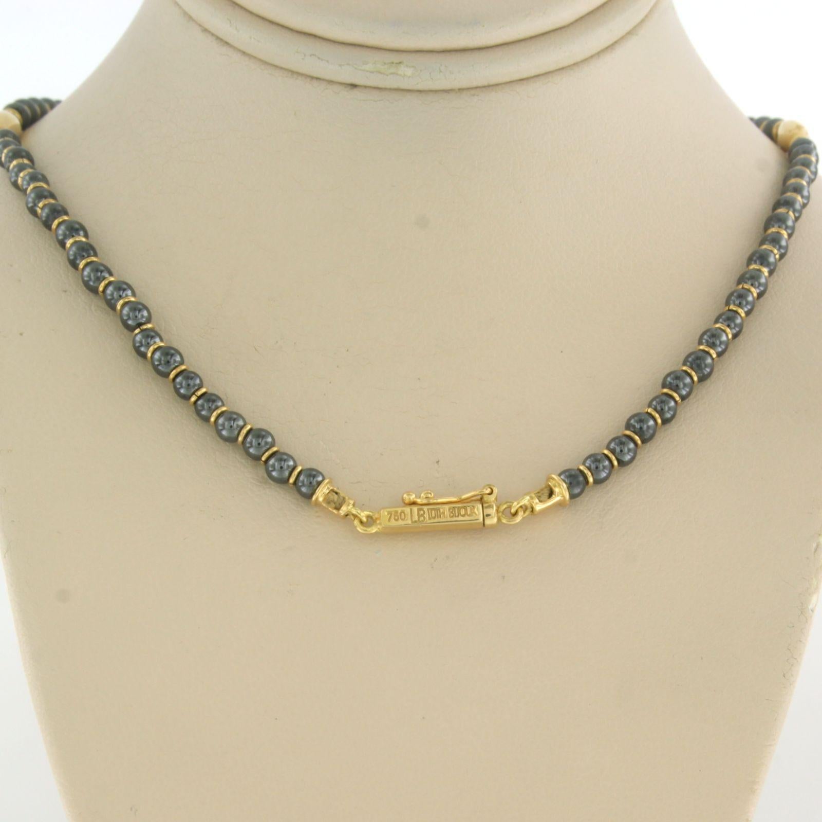 LUTH DESIGN - necklace with hematite, moonstone and diamonds 18k yellow ...