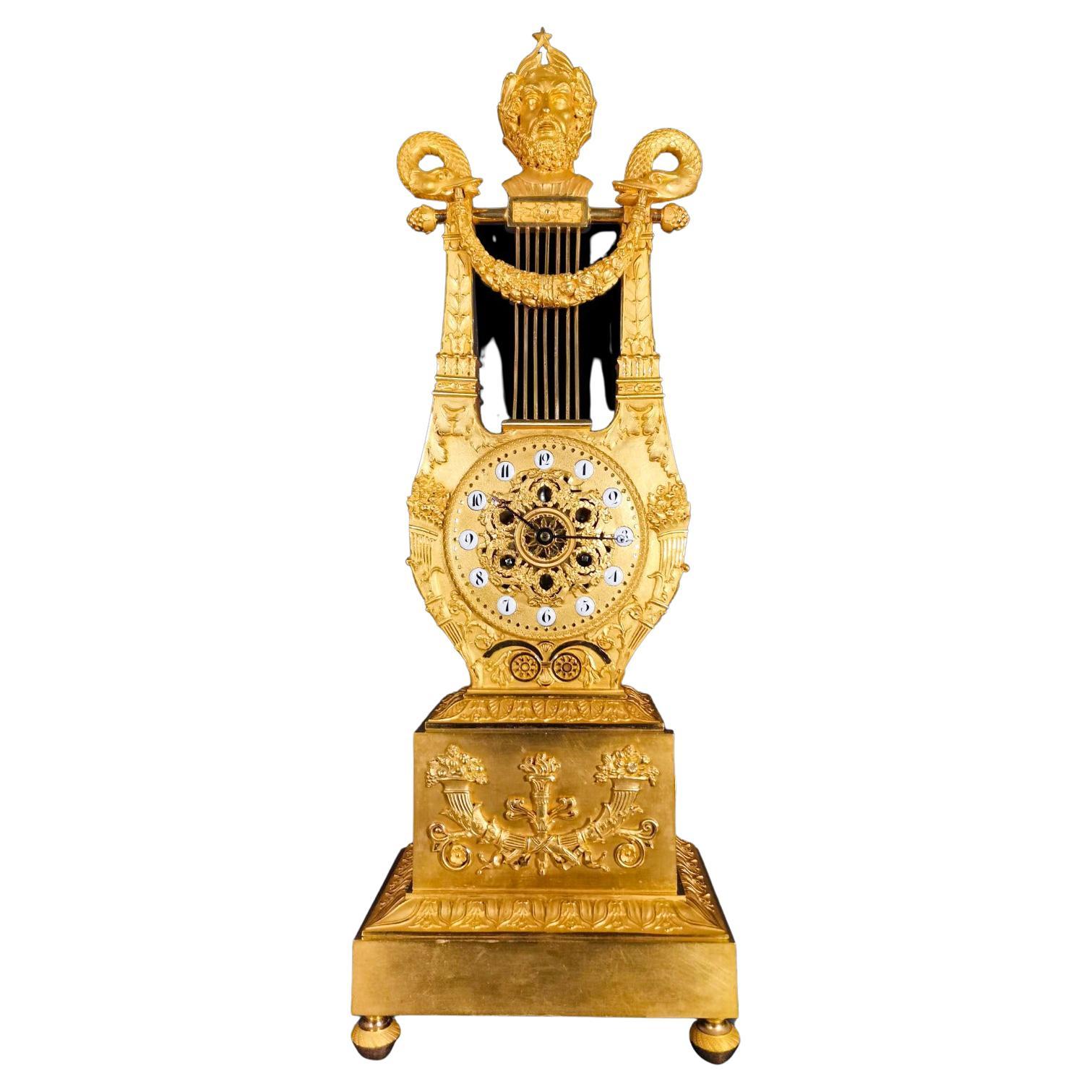 French Restoration Gilt Bronze Clock For Sale at 1stDibs