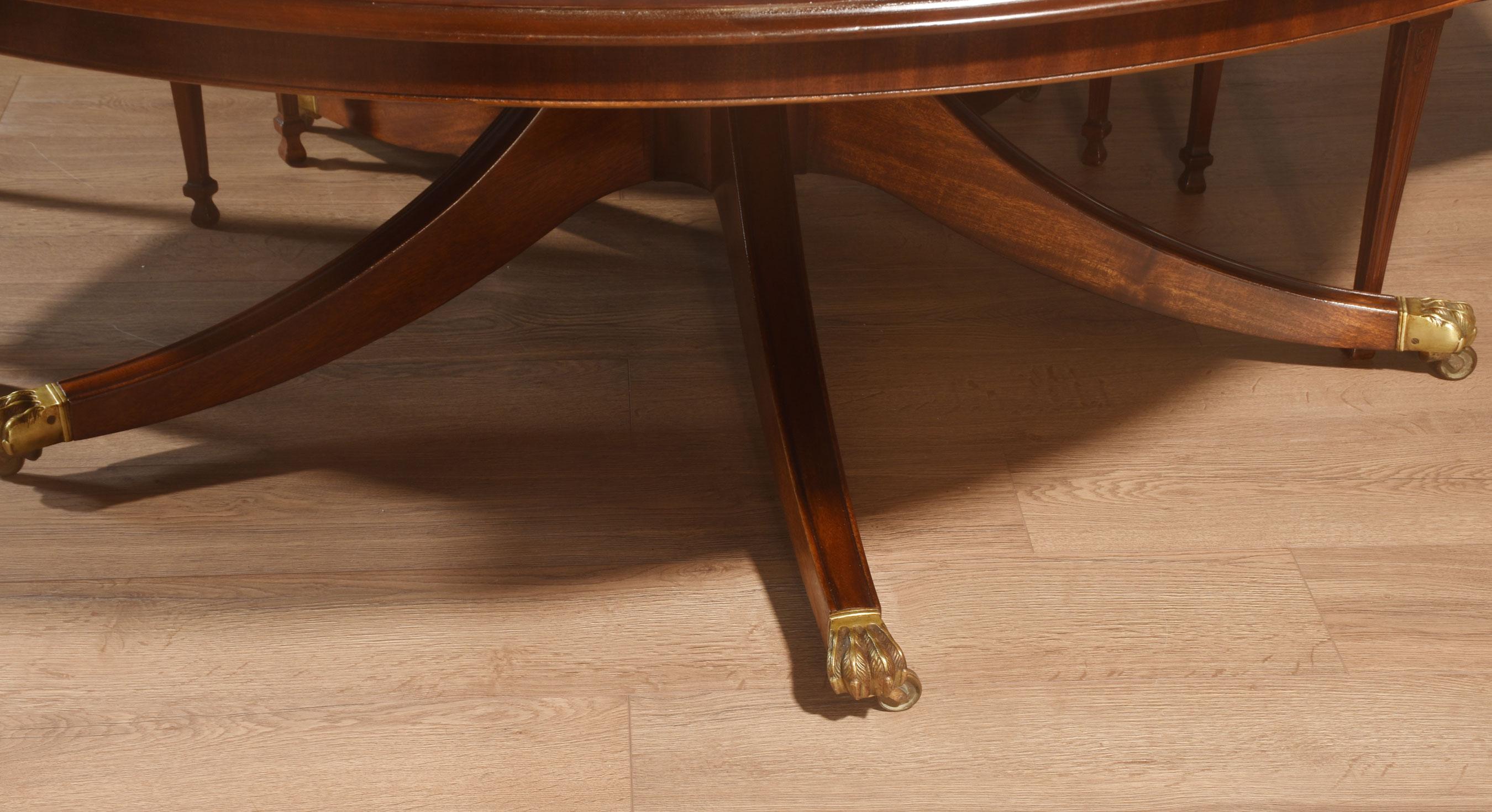 Mahogany cross banded circular dining table For Sale at 1stDibs