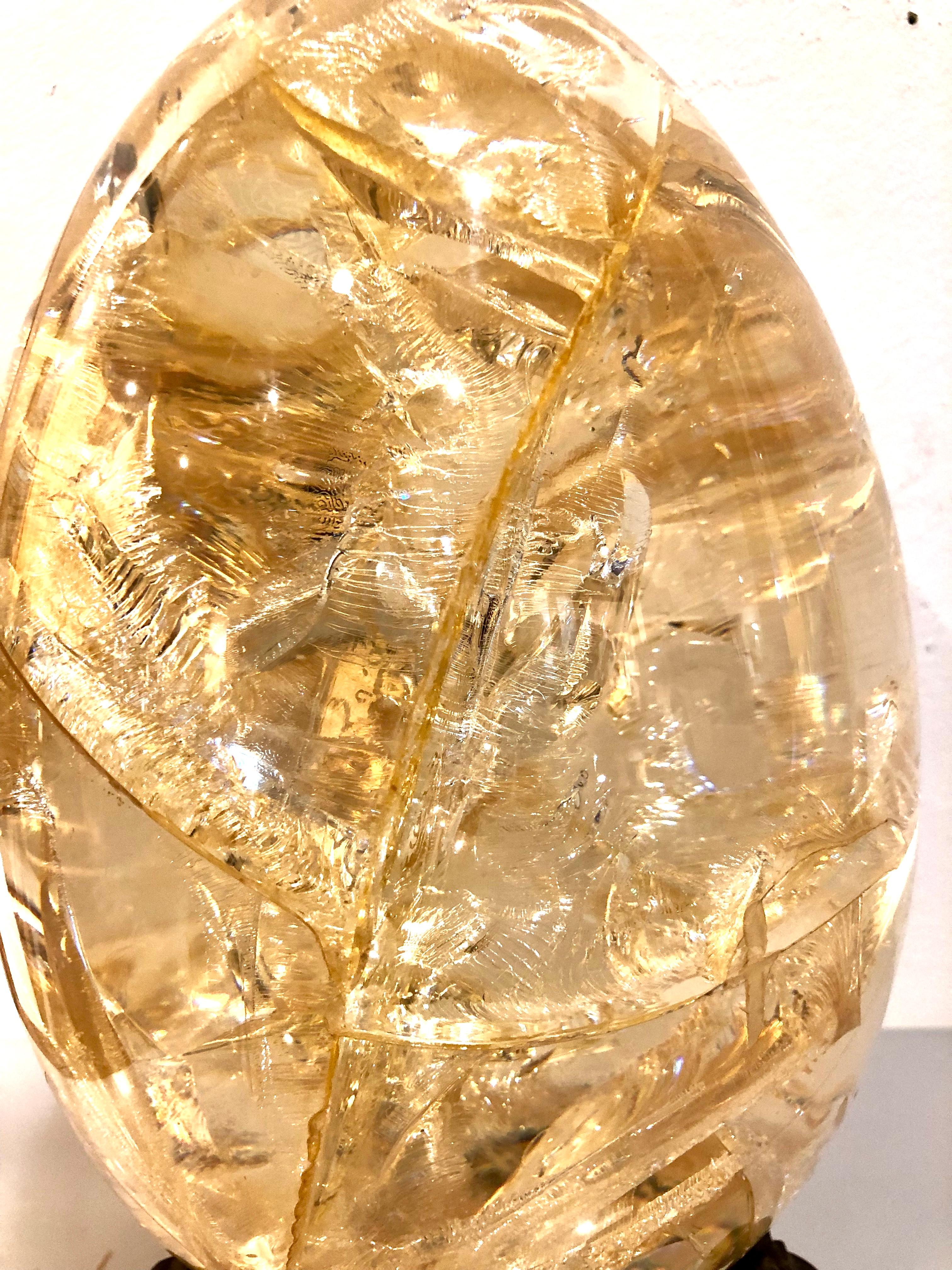 Majestic Oversize Cracked Lucite or Resin Egg on Brass Base at 1stDibs