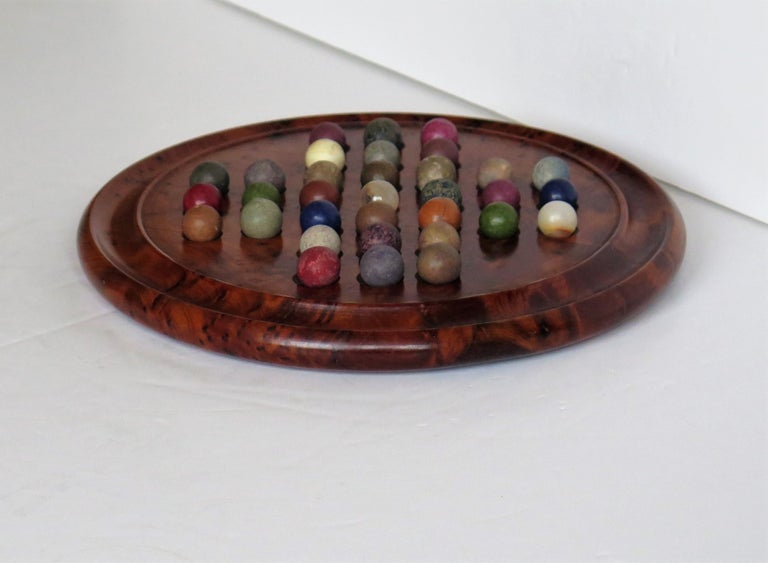 Marble Solitaire Board Game with 33 Early Handmade Stone Marbles, circa ...