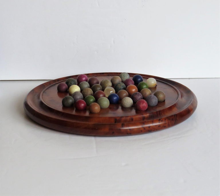 Marble Solitaire Board Game with 33 Early Handmade Stone Marbles, circa ...