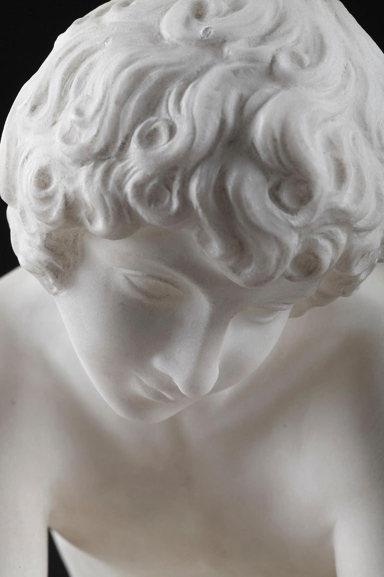 Marble Statue Cupid Playing with a Butterfly at 1stDibs
