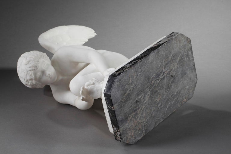 Marble Statue Cupid Playing with a Butterfly at 1stDibs