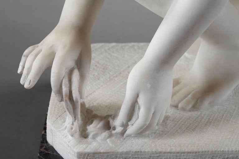 Marble Statue Cupid Playing with a Butterfly at 1stDibs