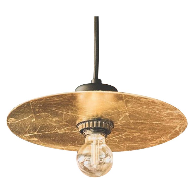 Ma'shar Gilded Gold Pendant Light With Black Cord For Sale at 1stDibs