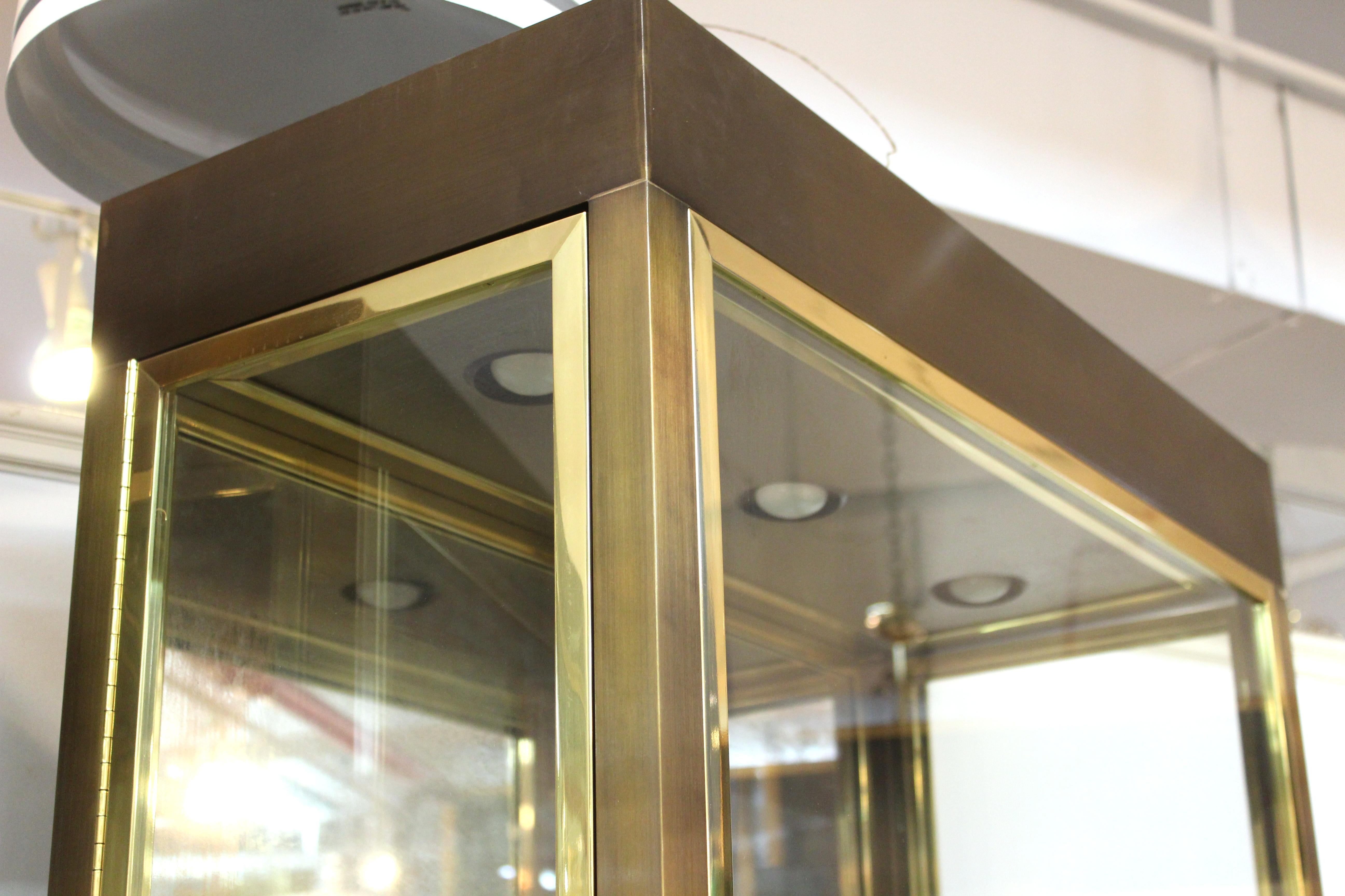 Mastercraft Vitrines with Glass Shelves and Illuminated Interior at ...