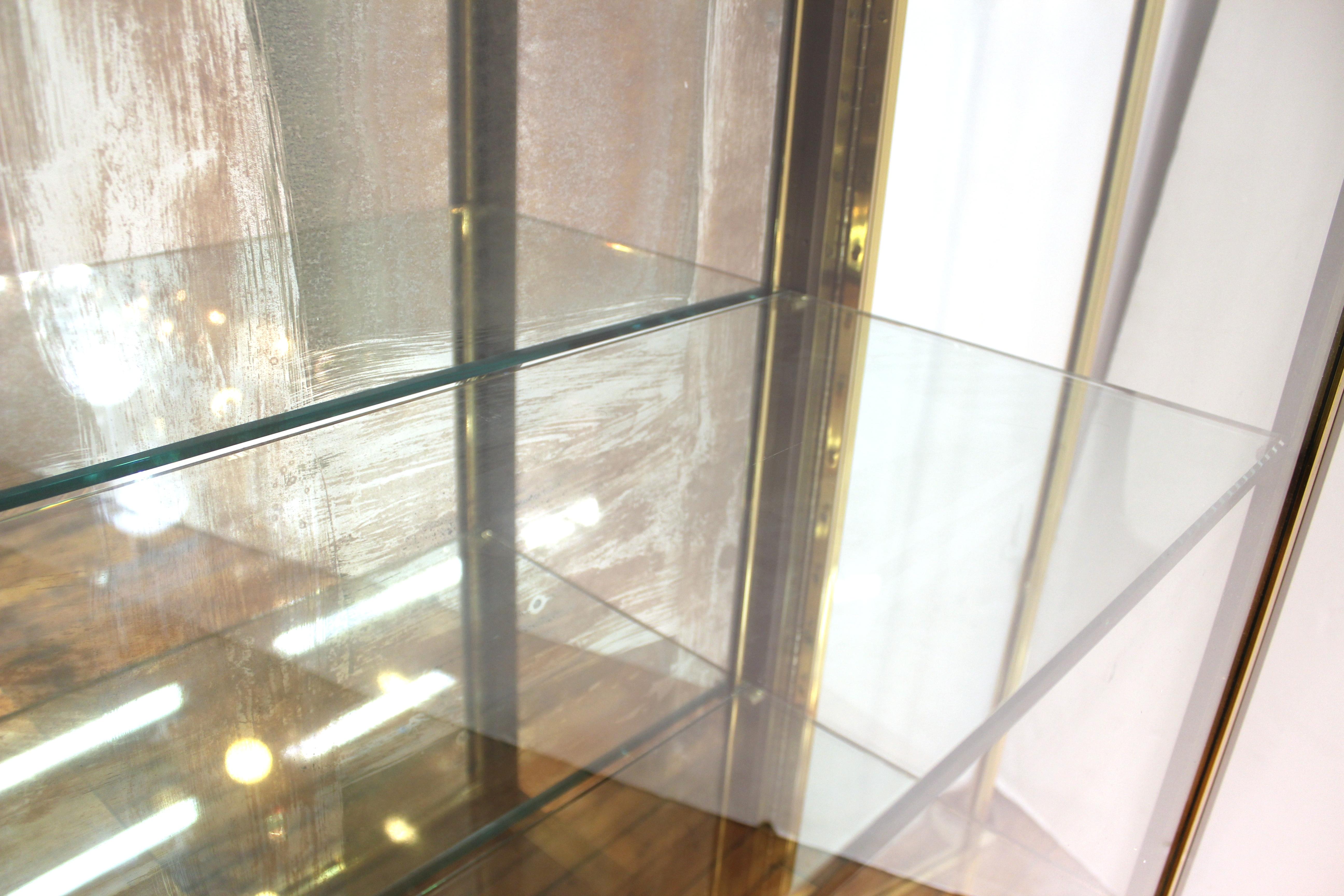 Mastercraft Vitrines with Glass Shelves and Illuminated Interior at ...