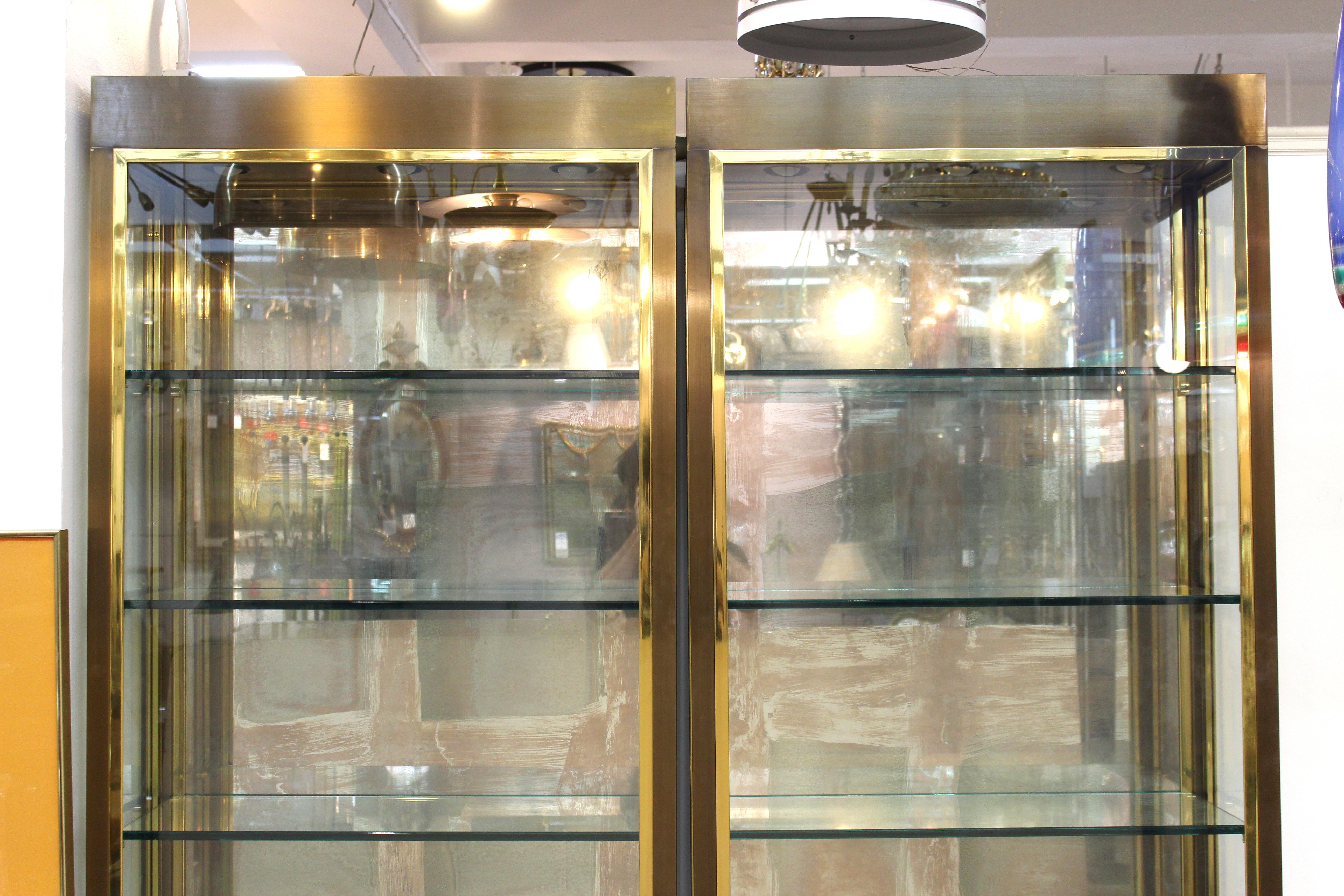 Mastercraft Vitrines with Glass Shelves and Illuminated Interior at ...