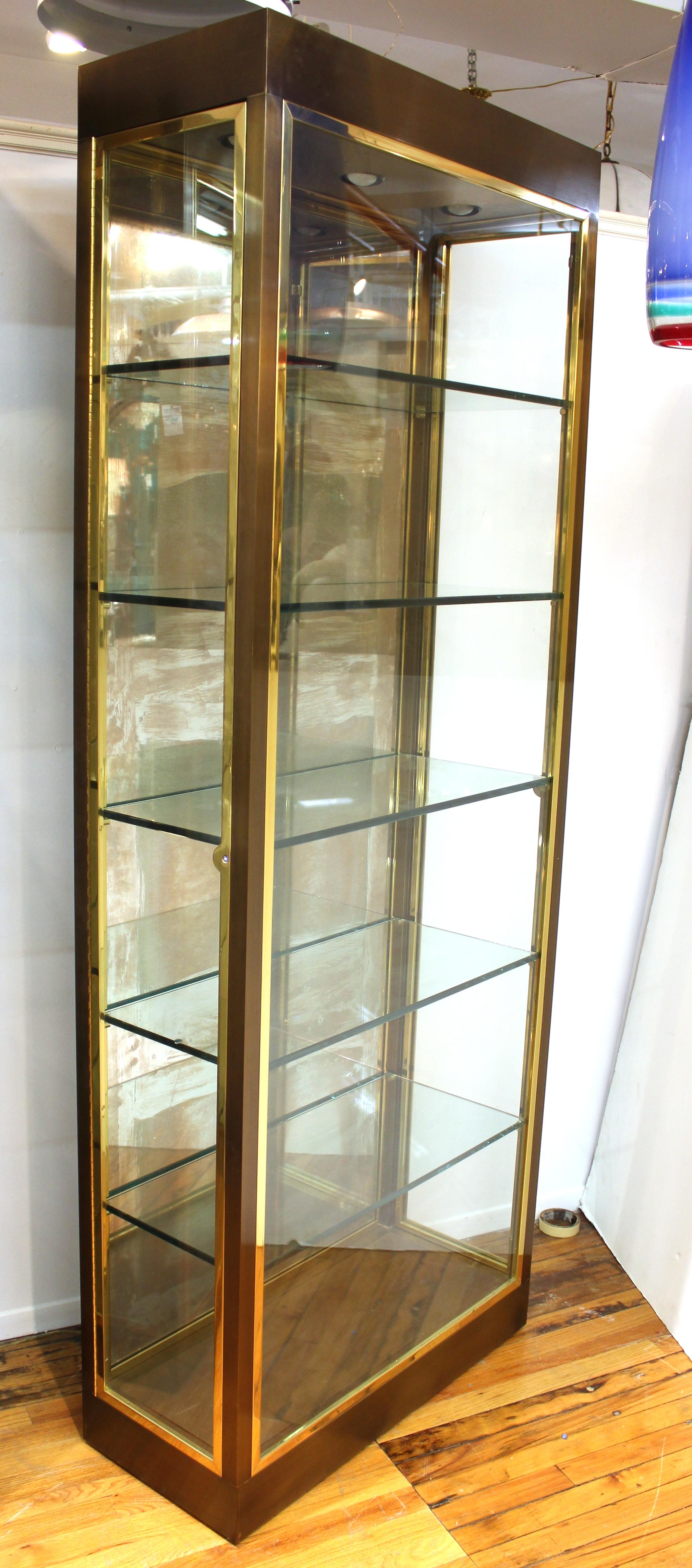 Mastercraft Vitrines with Glass Shelves and Illuminated Interior at ...