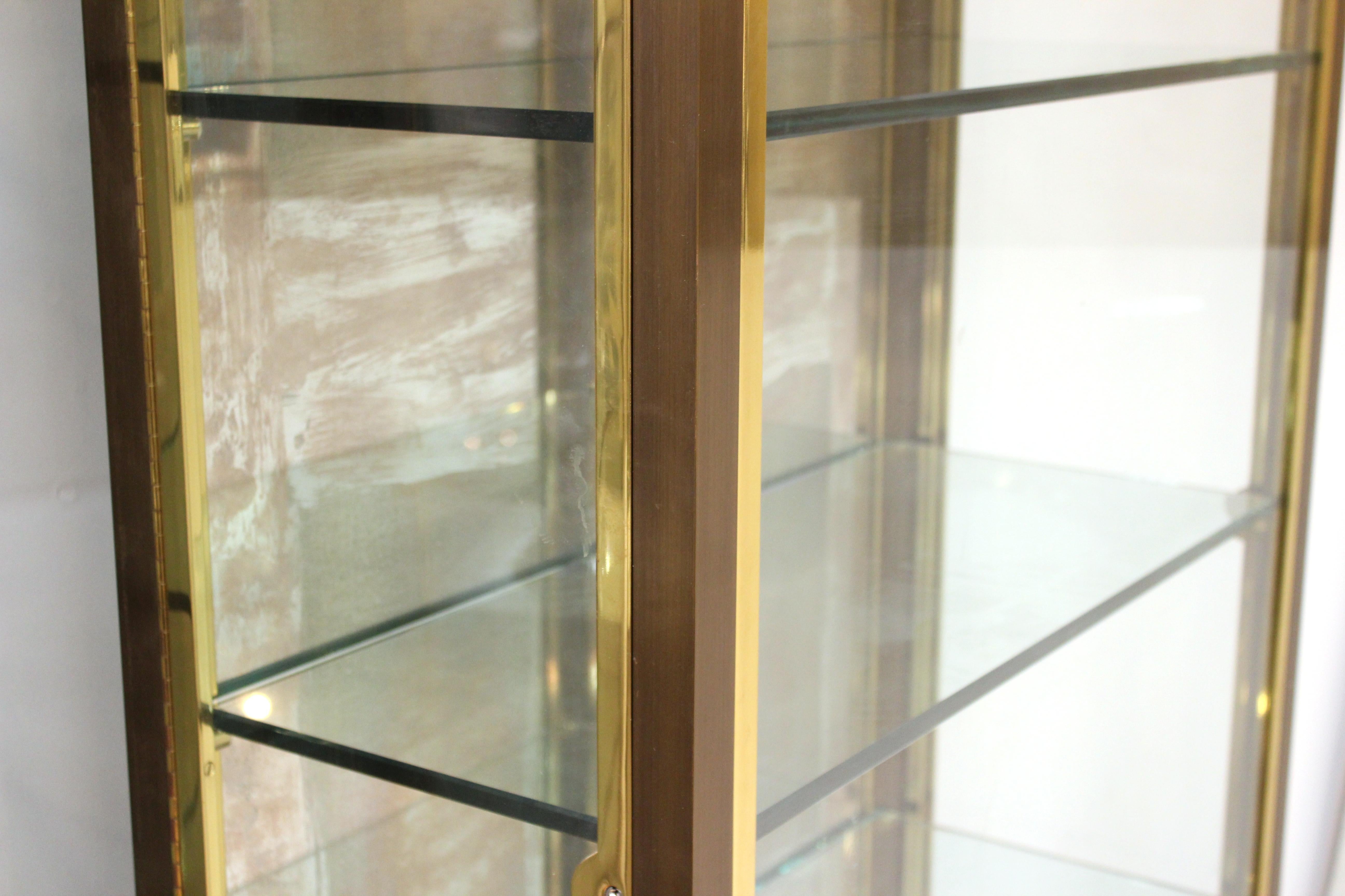 Mastercraft Vitrines with Glass Shelves and Illuminated Interior at ...