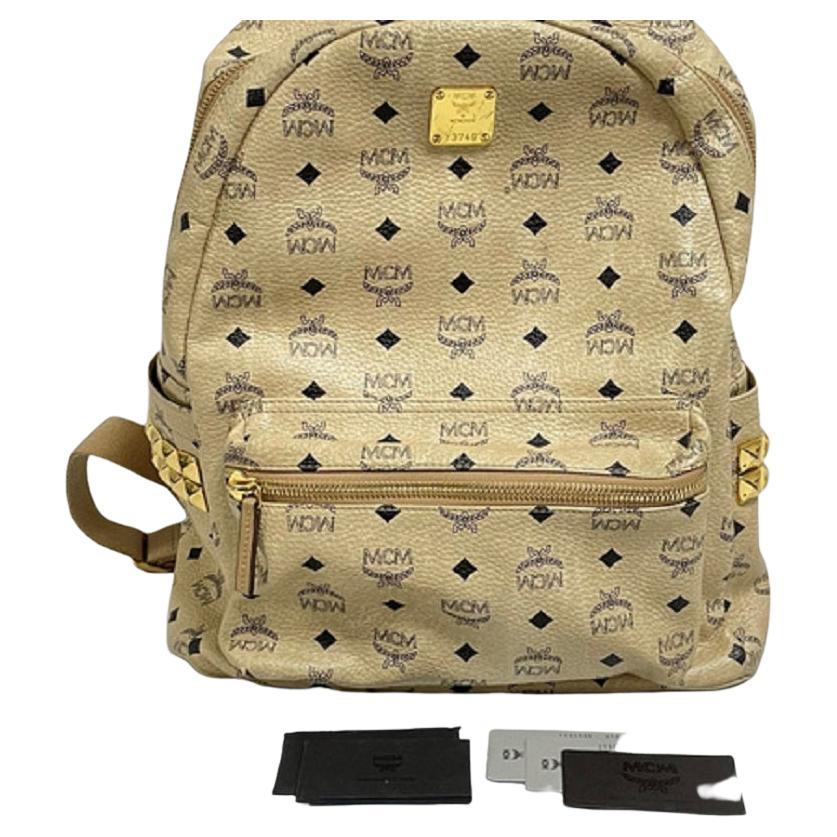 MCM Silver Canvas Monogram Black Crystal Studded Mini Backpack Bag at ...