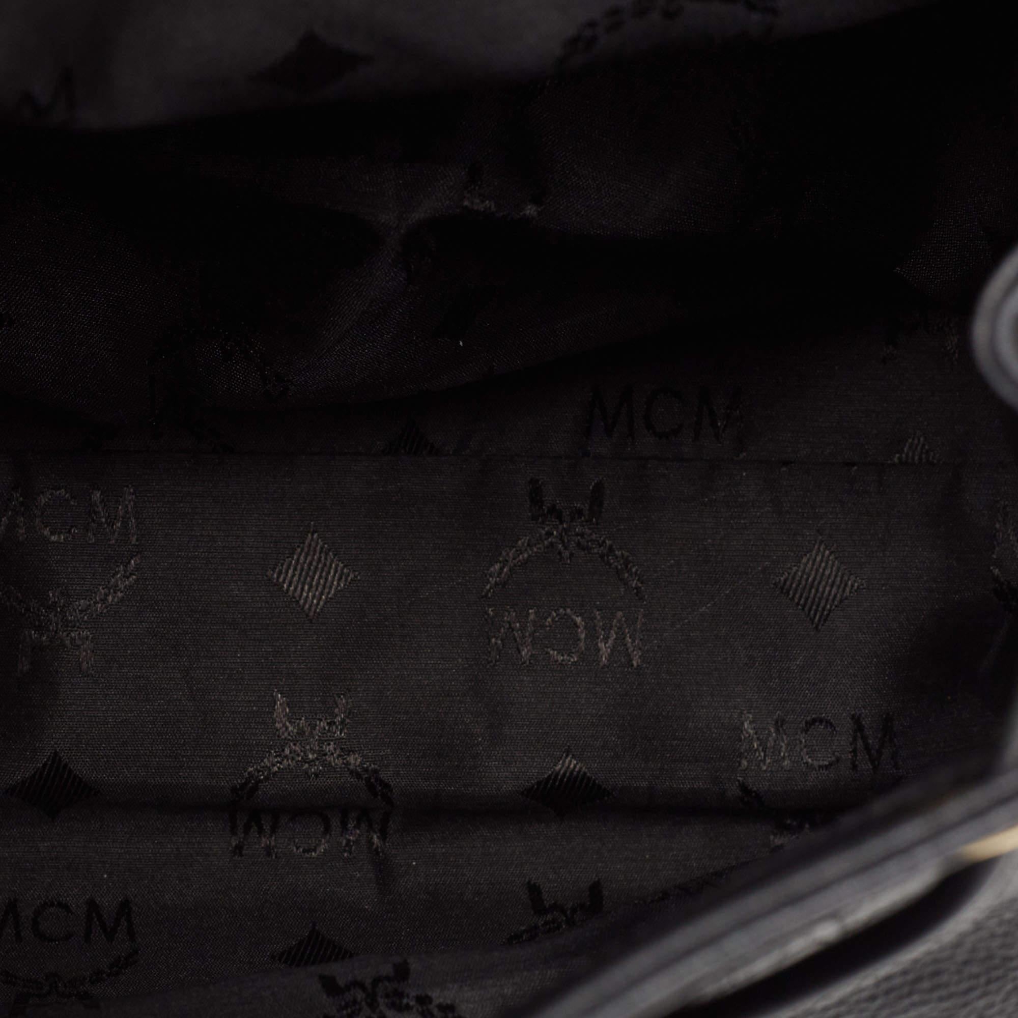 MCM Black Leather Studded Flap Backpack For Sale at 1stDibs