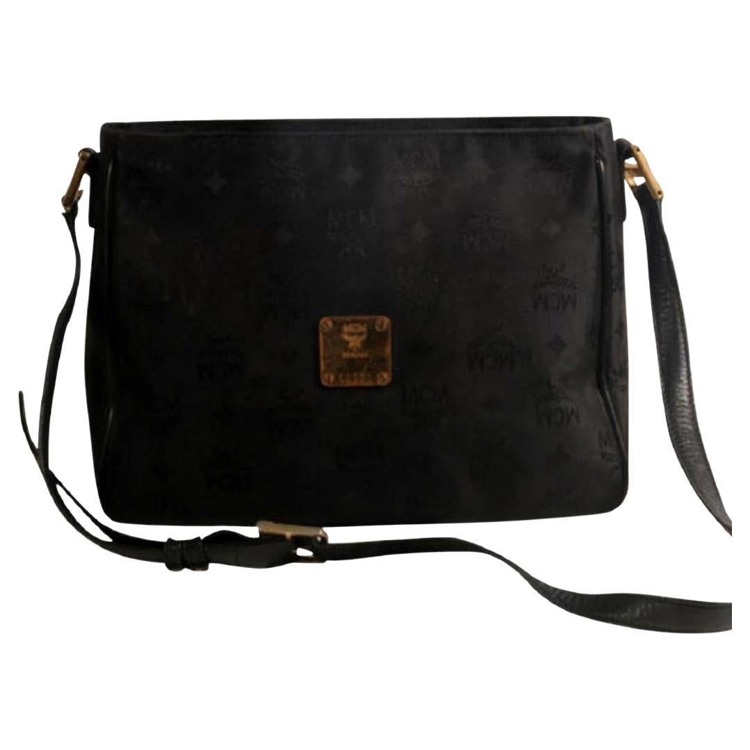 MCM Fur and Snake-Embossed Leather Satchel For Sale at 1stDibs