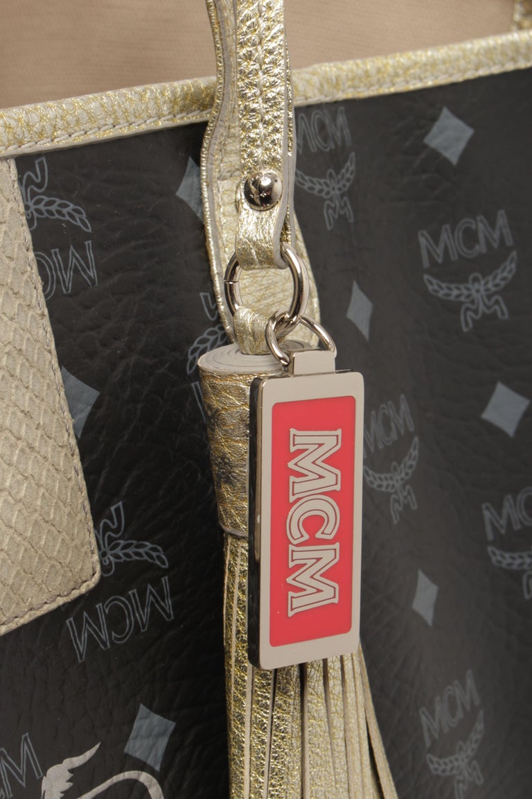 MCM Black Visetos Leather Striped Lion Shopper Bag For Sale at 1stDibs