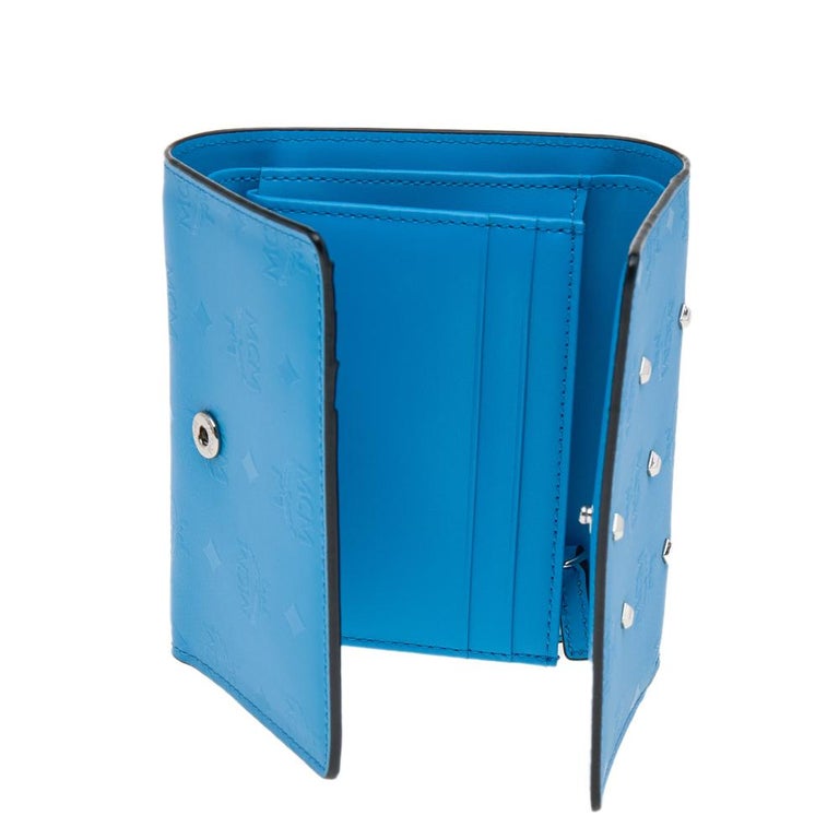 MCM Blue Coated Canvas Studded Claudia Trifold Wallet at 1stDibs