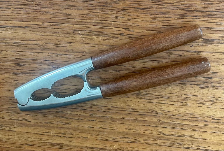 MCM Walnut and Stainless Steel Nutcracker For Sale at 1stDibs