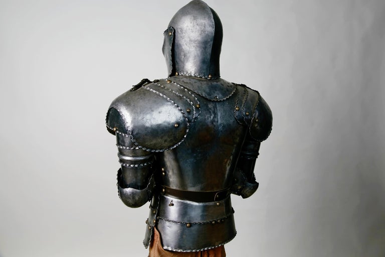Medieval Style Suit of Fully Articulating Armor with Sword on Display ...