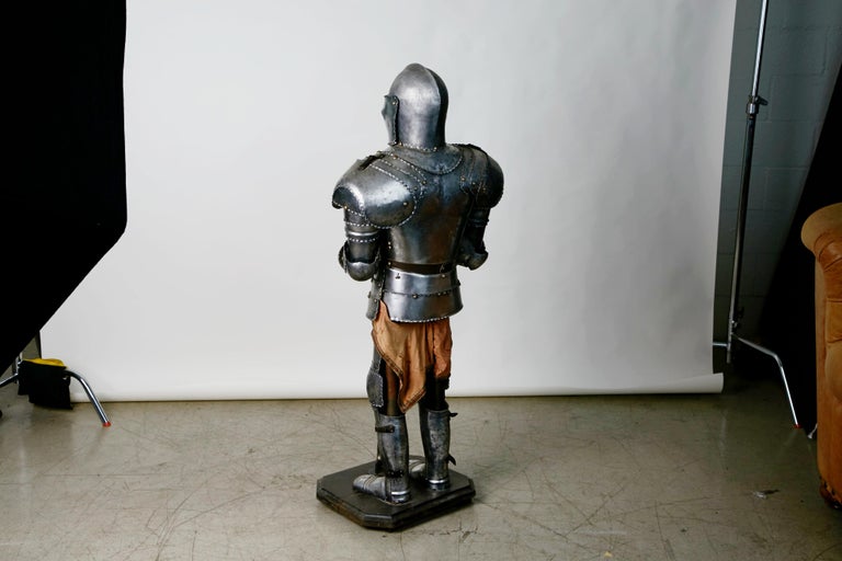 Medieval Style Suit of Fully Articulating Armor with Sword on Display ...