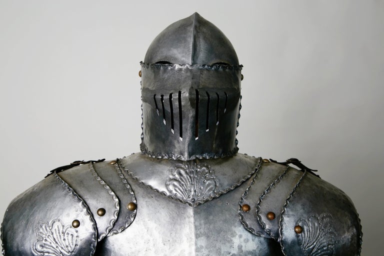 Medieval Style Suit of Fully Articulating Armor with Sword on Display ...