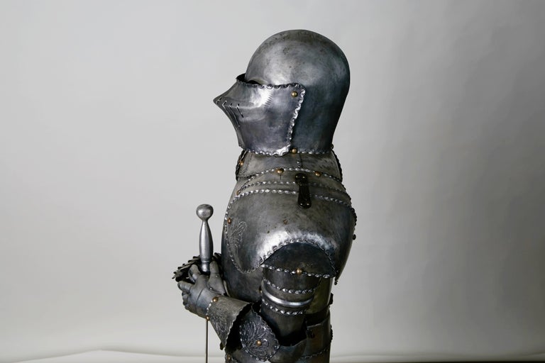 Medieval Style Suit of Fully Articulating Armor with Sword on Display ...