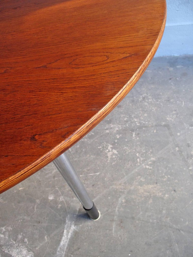 Meredew working round teak top table with height adjustable chrome legs ...