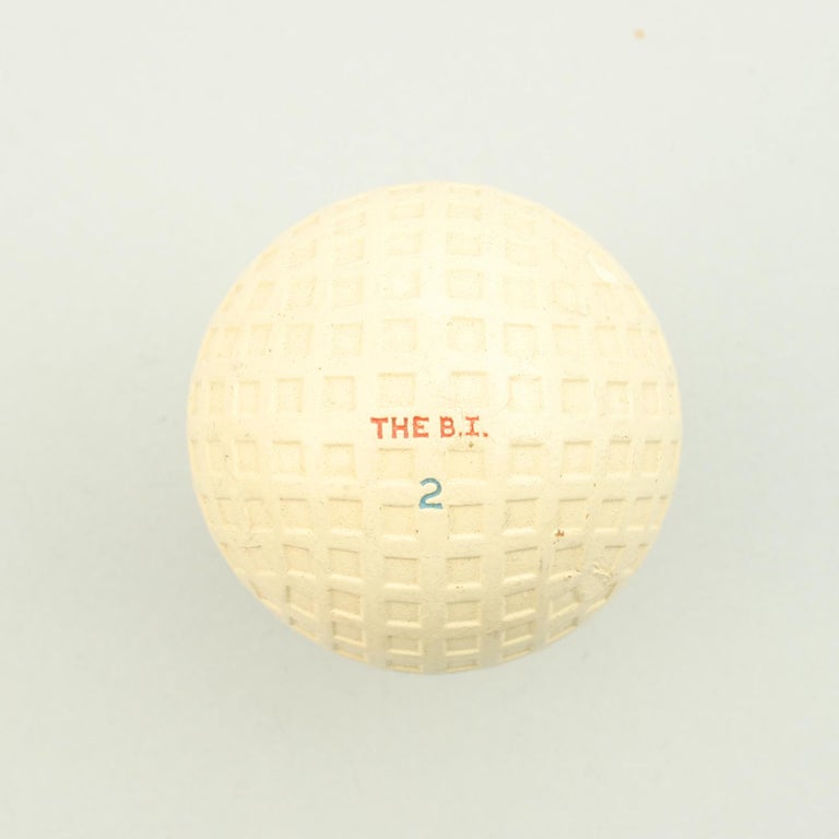 Mesh Patterned ''b.i'' Golf Ball For Sale at 1stDibs