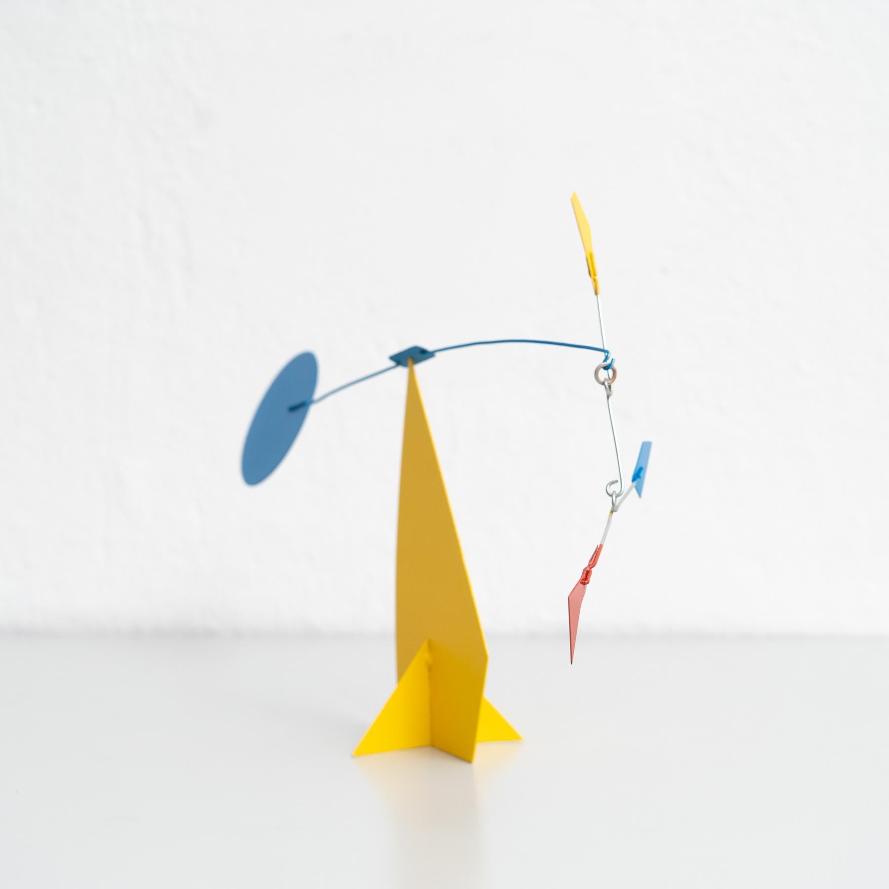Mesmerizing Kinetics: Iron Sculpture - Painted Motion and Color For ...