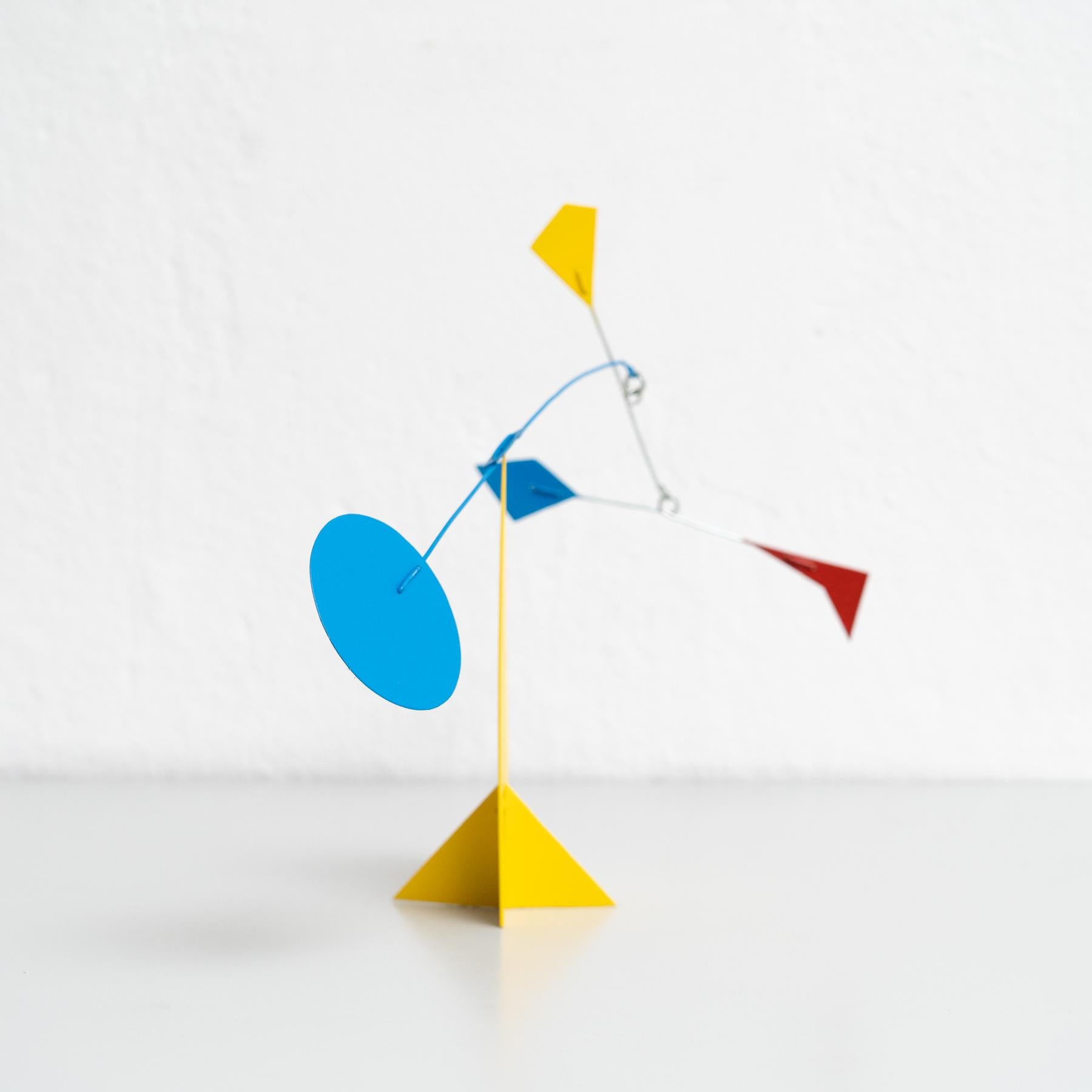 Mesmerizing Kinetics: Iron Sculpture - Painted Motion and Color For ...
