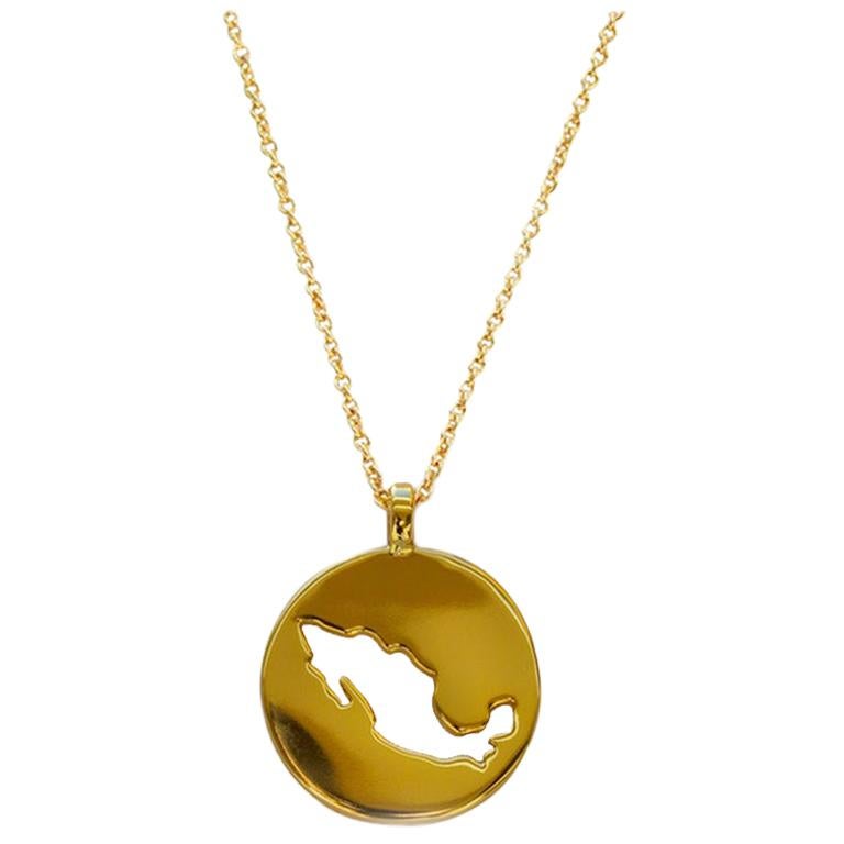 Mexico gold plated pendant by Cristina Ramella For Sale at 1stDibs