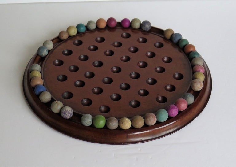 Marble Solitaire Game Mahogany Board 37 Handmade Clay /Stone Marbles at ...