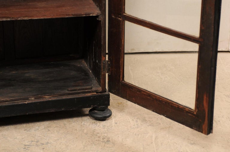 Mid-20th Century Black British Colonial Tall Display Cabinet at 1stDibs