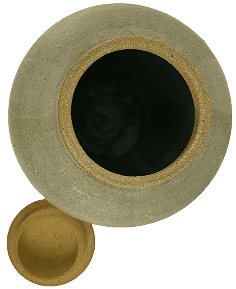 Mid 20th century hand turned clay lidded jar with a lava glazed finish ...