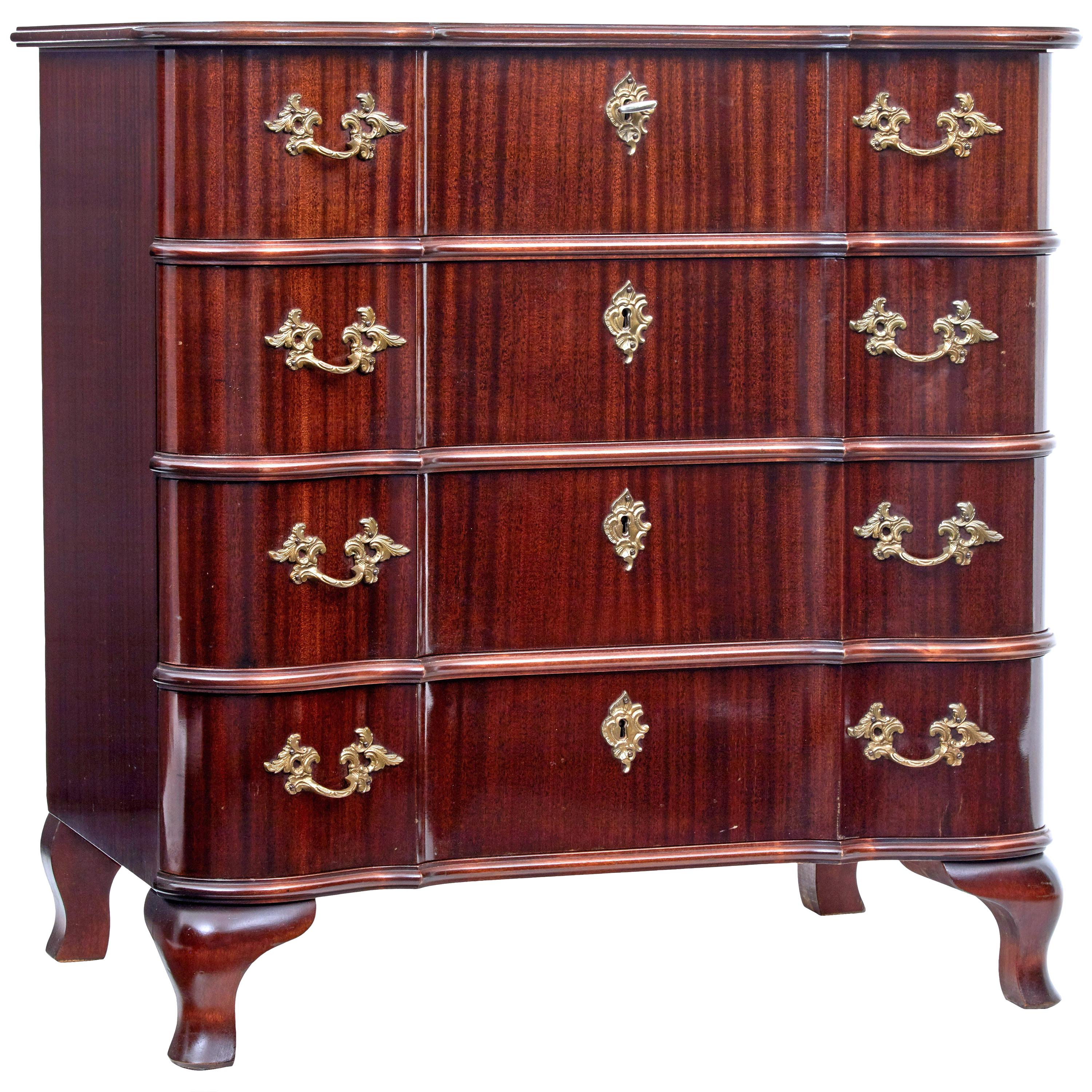 Mid-20th Century Shaped Mahogany Chest of Drawers at 1stDibs