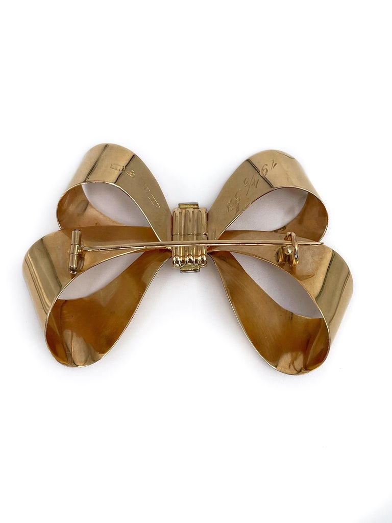 Mid Century 18 Karat Yellow Gold Zircon Bow Pin Brooch For Sale at 1stDibs