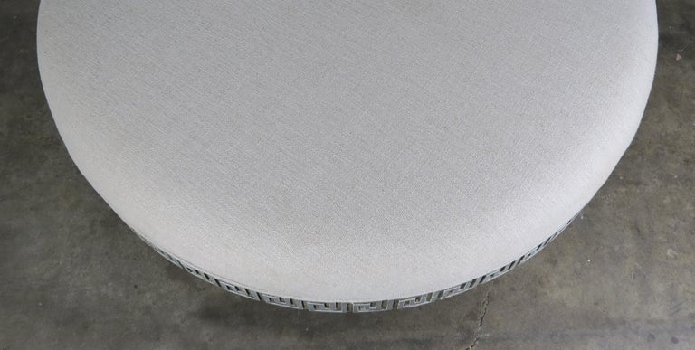 Midcentury Carved Greek Key Round Linen Ottoman at 1stDibs