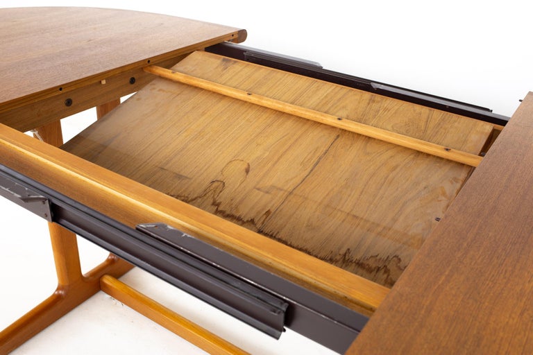 Mid Century Danish Teak Expanding Hidden Leaf Dining Table at 1stDibs