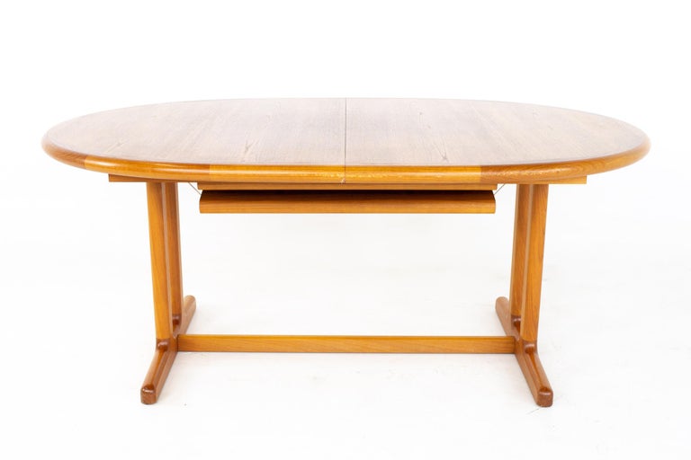 Mid Century Danish Teak Expanding Hidden Leaf Dining Table at 1stDibs