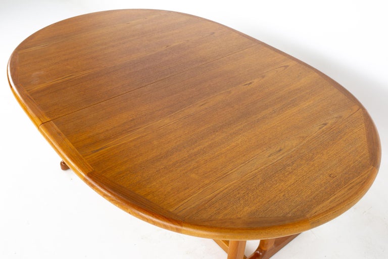 Mid Century Danish Teak Expanding Hidden Leaf Dining Table at 1stDibs