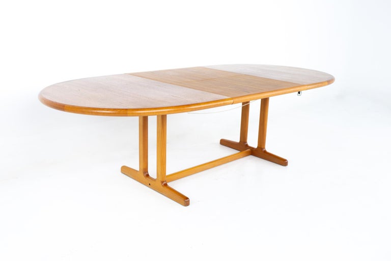 Mid Century Danish Teak Expanding Hidden Leaf Dining Table at 1stDibs