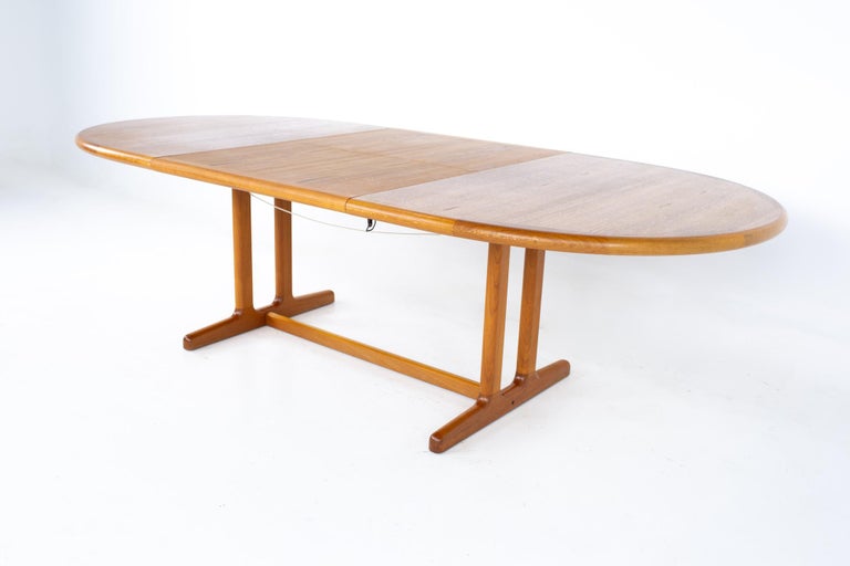 Mid Century Danish Teak Expanding Hidden Leaf Dining Table at 1stDibs
