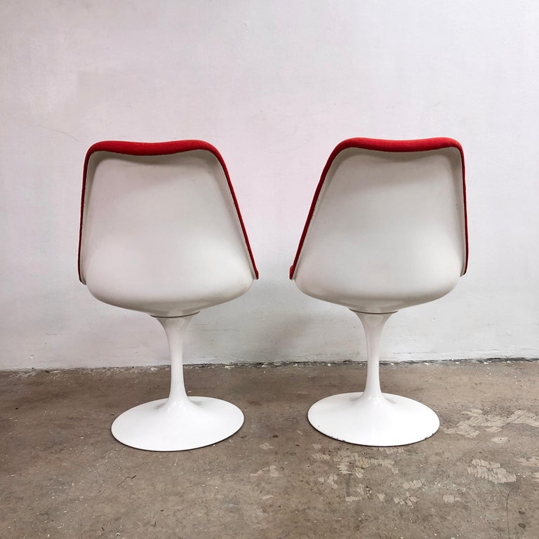 Mid Century Eero Saarinen Swivel Tulip Chairs and Early Cast Iron Dining Table For Sale at 1stDibs