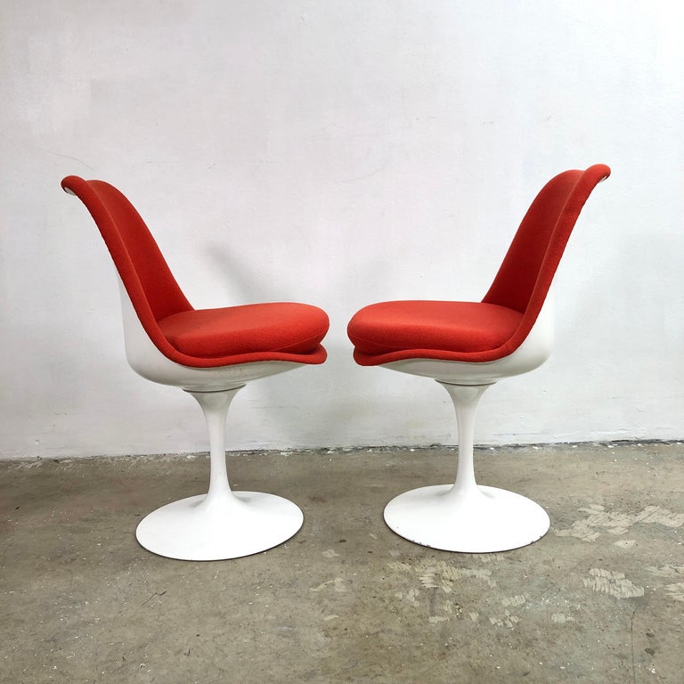 Mid Century Eero Saarinen Swivel Tulip Chairs and Early Cast Iron Dining Table For Sale at 1stDibs