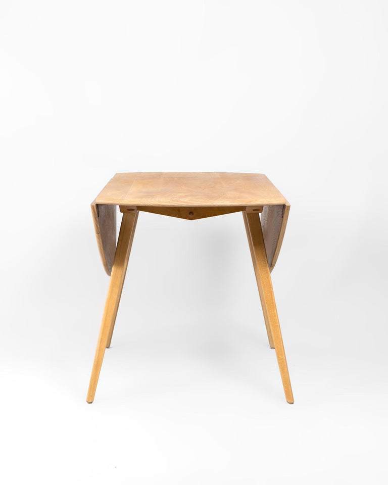Mid Century Elm and Beech Round Dining Table by L. Ercolani for Ercol ...
