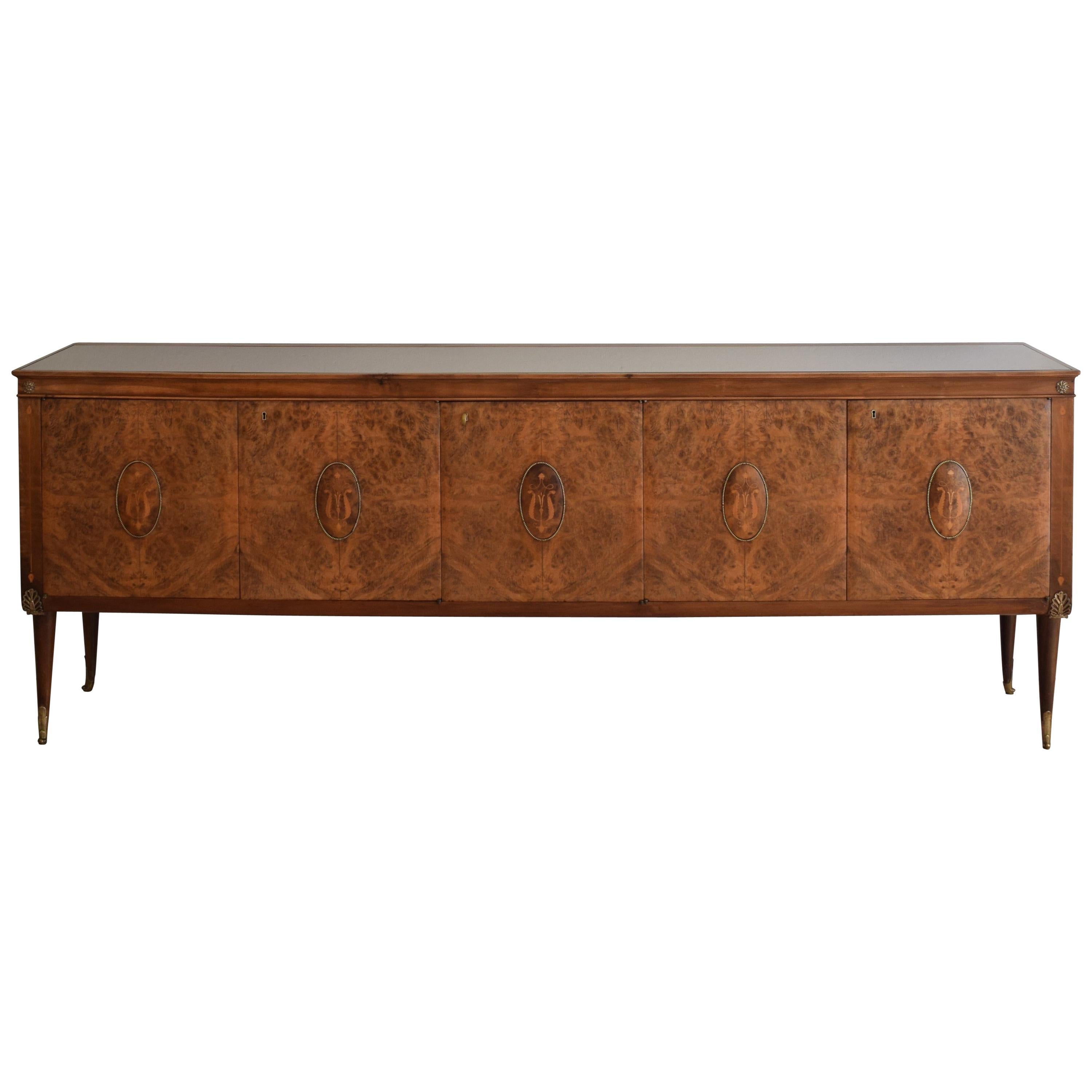 An Italian Parchment Covered and Ebonised Demi-Lune Sideboard at 1stDibs