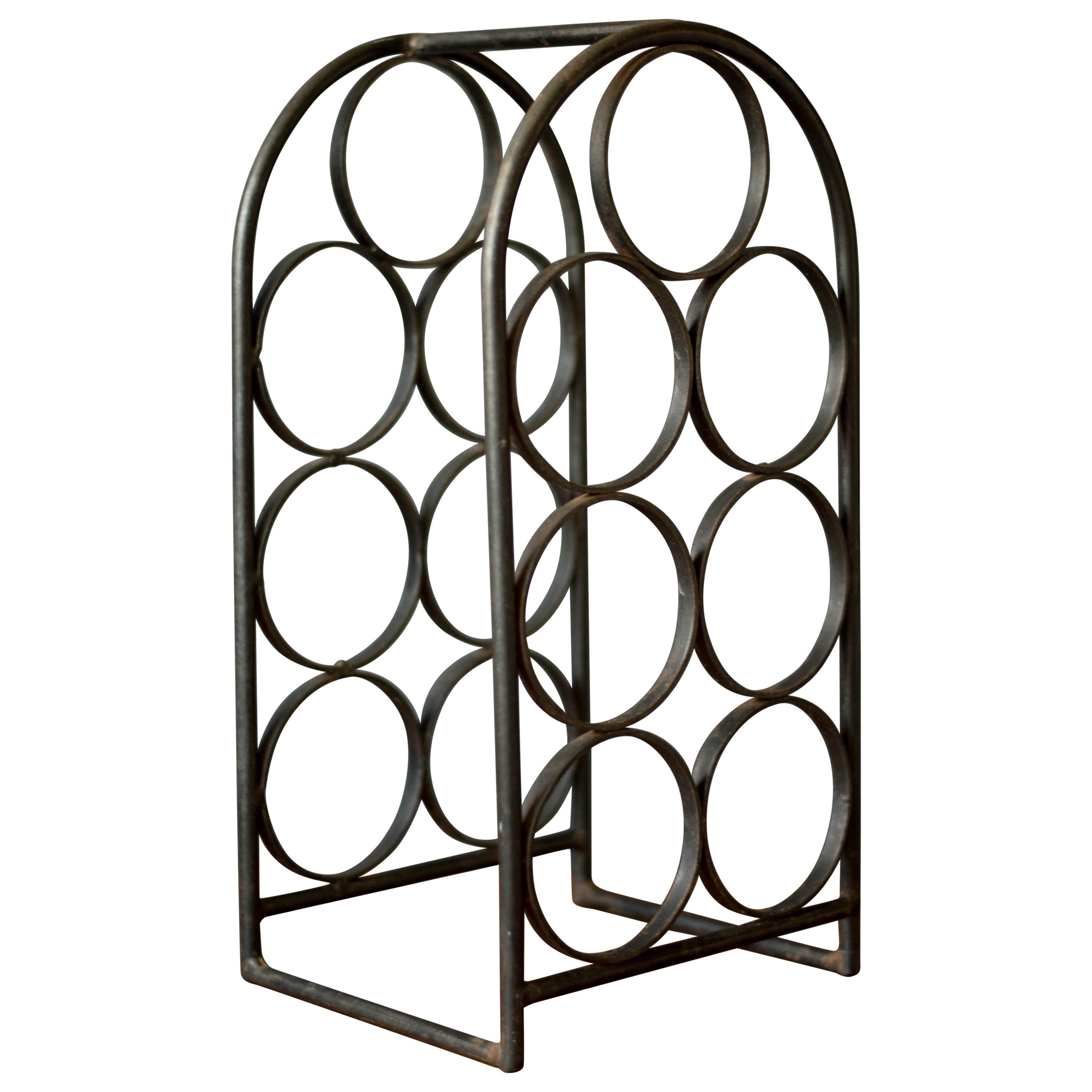 Mid-Century Modern Iron and Leather Wine Rack by Arthur Umanoff at 1stDibs