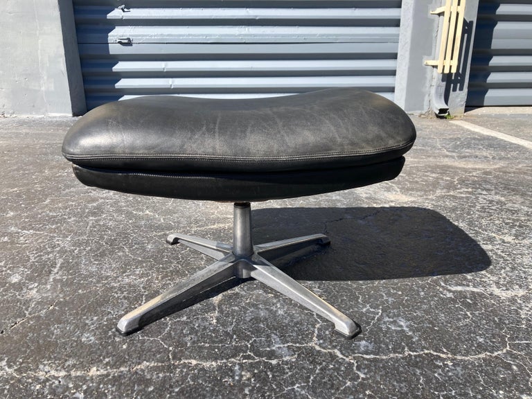Mid-Century Modern Black Leather Swivel Ottoman Stool For Sale at 1stDibs