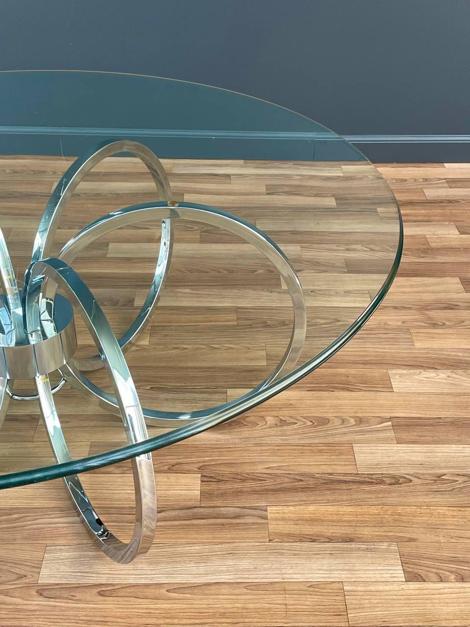 Mid-Century Modern Chrome Disc and Glass Coffee Table For Sale at 1stDibs
